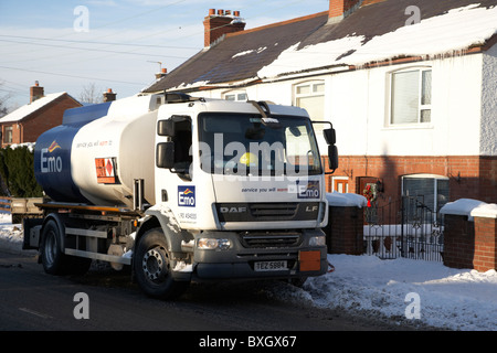 home heating oil tank covered in snow on a cold snowy winters day ...