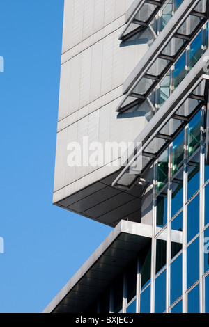 Modern office building facade close-up with minimalist vertical frames ...