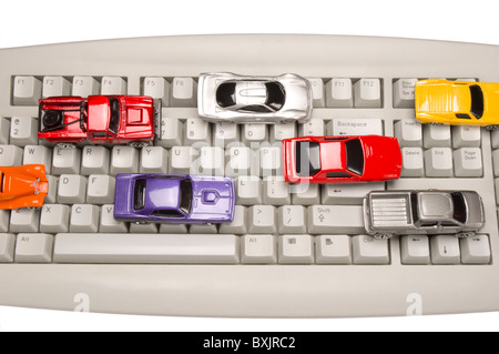 Model cars on a computer keyboard Stock Photo - Alamy