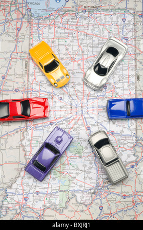 Cars driving across map Stock Photo - Alamy