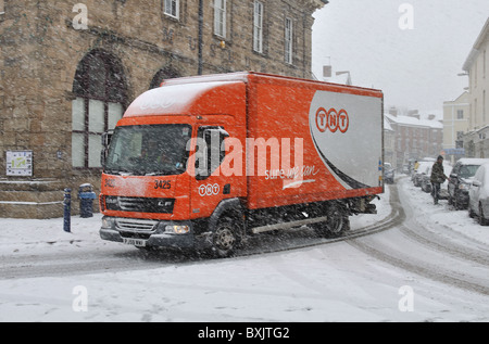 TNT lorry in snow, Warwick town centre, UK Stock Photo - Alamy