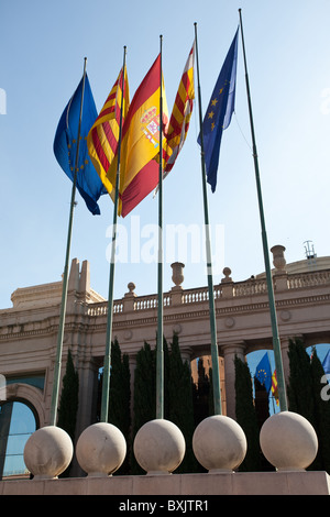 The flags of Spain, Catalonia, and Europe fluttering in the wind ...