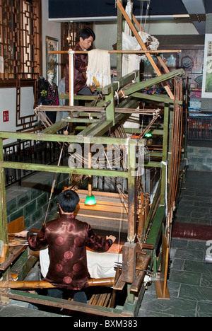 Chengdu Sichuan China Silk brocade cloth being by hand woven on loom in ...