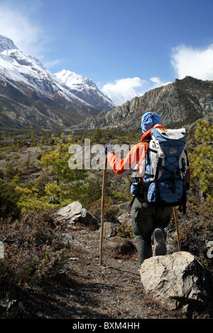 A female trekker on the Annapurna circuit trek in Nepal Stock Photo - Alamy