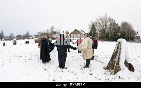 Druids celebrating the Winter Solstice at the Avebury stone circle in ...