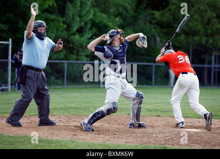 Baseball pitcher, batter and umpire in ready position Stock Photo ...