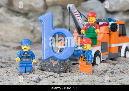 Lego workmen with the letter 'b' Stock Photo - Alamy