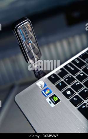 Notebook with modem usb Stock Photo - Alamy