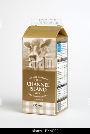 A carton of British full fat pasteurised milk with a blue bottle top ...