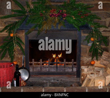 Open Fireplace with Log Fire, Winter Stock Photo - Alamy