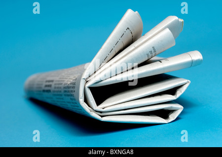 A folded newspaper Stock Photo - Alamy