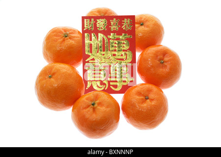 Red Packet and Mandarins Stock Photo - Alamy
