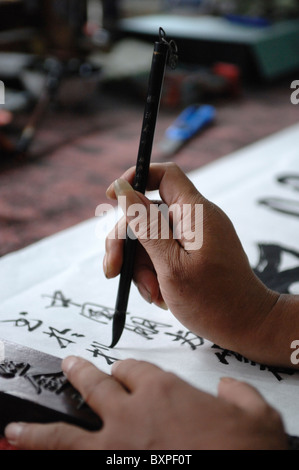 closeup traditional writing brush on the desktop, Japanese writing ...