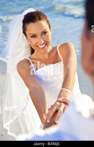 Beautiful and happy couple of just married has fun and fighting by ...