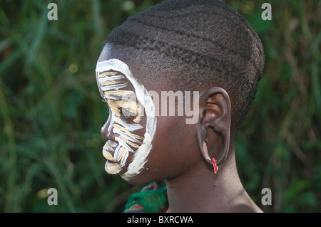 Surma girl with body paintings and distorted ears, Kibish, Omo River ...
