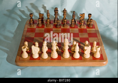 Chess pieces in starting position on a wooden oak Board Stock Photo - Alamy