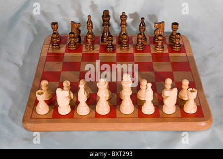 Chess pieces in starting position on a wooden oak Board Stock Photo - Alamy