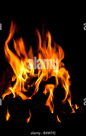 Real fire flames in fireplace. Outdoor fireplace Stock Photo - Alamy