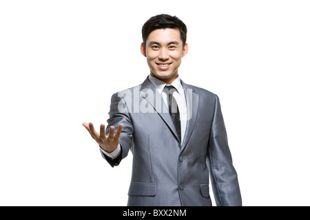 Businessman doing holding action Stock Photo - Alamy