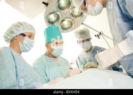 Female patient lying on an operating table Stock Photo: 15035855 - Alamy