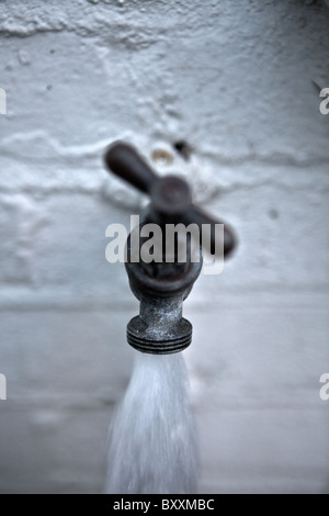 Running Garden Tap Stock Photo - Alamy