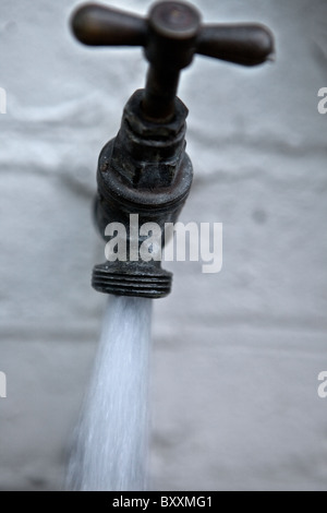 Running Garden Tap Stock Photo - Alamy