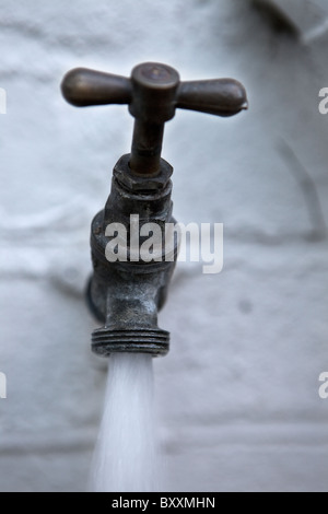 Running Garden Tap Stock Photo - Alamy