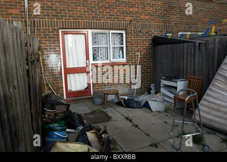 Untidy garden back yard Stock Photo - Alamy