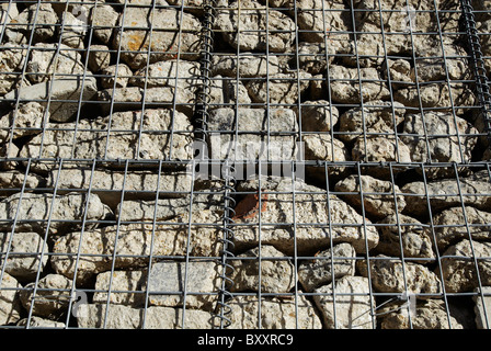 stone wall in wire mesh Stock Photo - Alamy