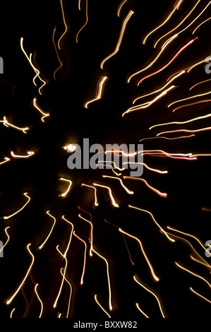 A vibrant array of multi-colored lights shining brightly against a deep ...