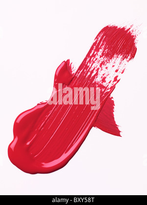 red paint splodge on a white background Stock Photo - Alamy