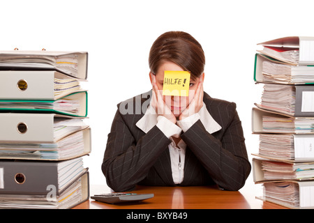 Business woman needs help to manage work. She is desperate and cries ...