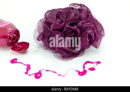 Purple bath sponge and shower gel Stock Photo - Alamy