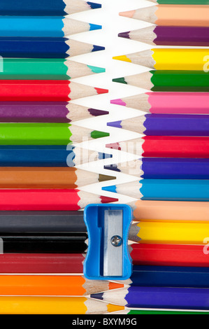 Fastener from color pencils. Abstract concept Stock Photo - Alamy