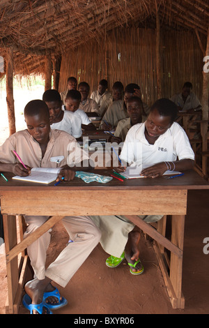 Students in an African village study during a typical school day Stock ...