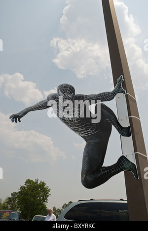 life size advertisement for movie Spider Man on light pole in shopping ...