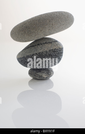 Three balanced stones Stock Photo - Alamy