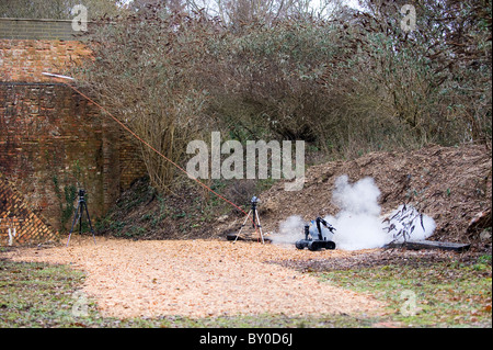 EOD Robot firing Water Jet Disruptor, training for dearming roadside ...