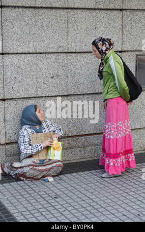 Beggar on the street in Spain Stock Photo - Alamy