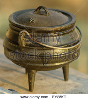 Traditional cast iron three-legged cooking pots from South Africa Stock ...