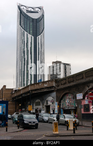 Elephant and Castle block of flats rising above low rise modern ...