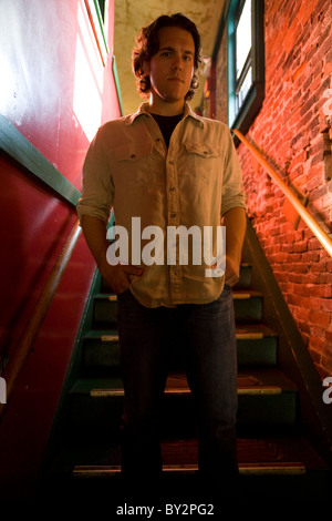 Portrait of singer / song writer, Jason Spooner, in the early morning ...