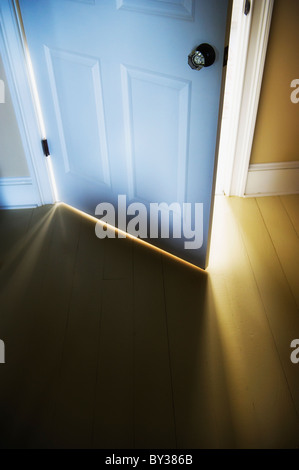 Light through an open door Stock Photo - Alamy
