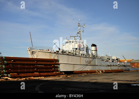 United States Navy minesweeper ships docked in naval base shipyard in ...
