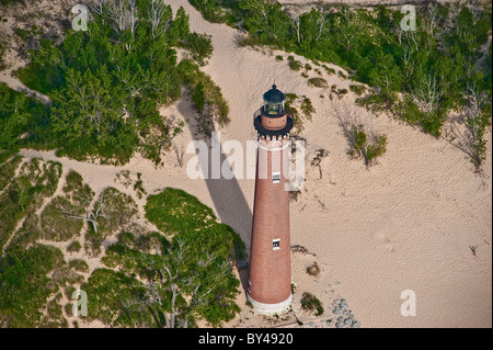 Aerial view of Little Sable Point Lighthouse at sunset over Lake ...