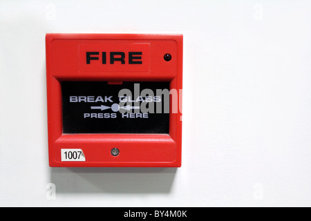 Fire alarm box break glass Stock Photo - Alamy