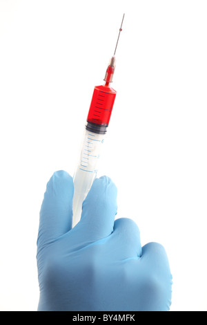 Syringe, medical injection in hand Stock Photo - Alamy