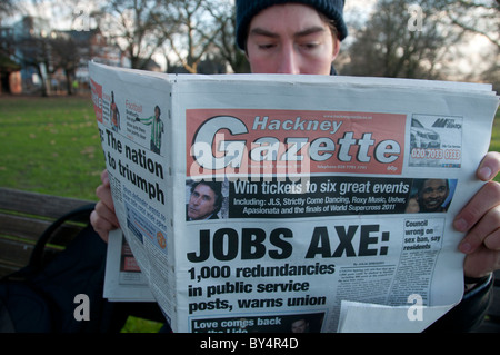 Hackney economic crisis. Newspaper with front page headline ' Jobs axe ...