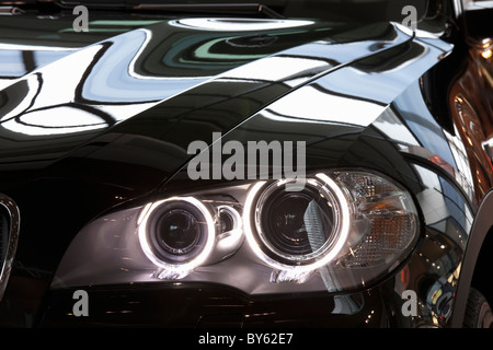 LED headlights on a BMW car Stock Photo - Alamy