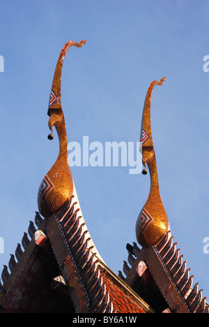 "Chofahs" on the roof of a Thai temple Stock Photo - Alamy